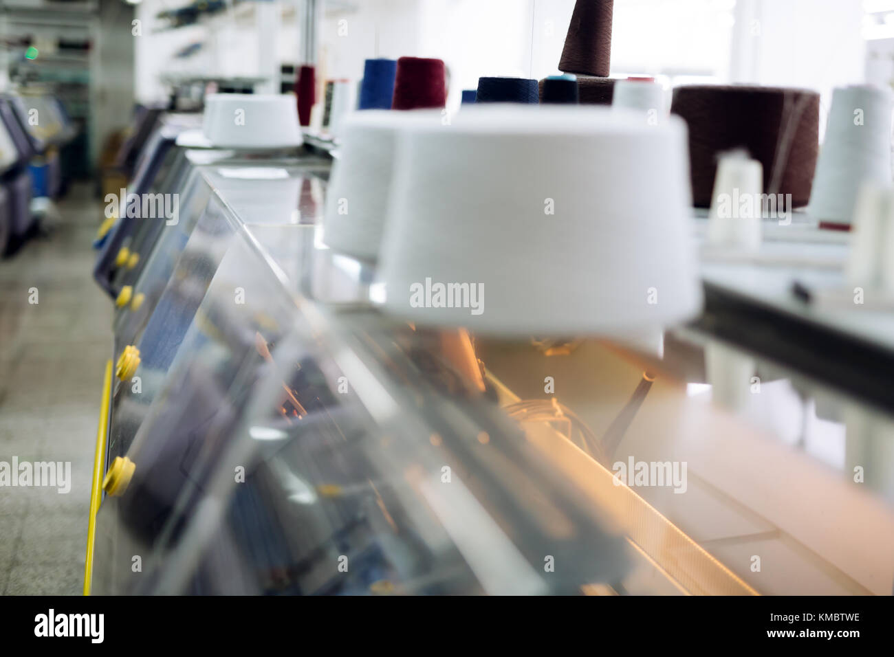 Computerized knitting machines Stock Photo - Alamy