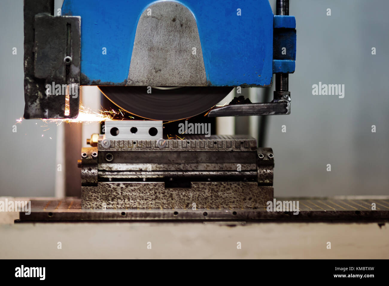 Polishing surface of metal in factory Stock Photo - Alamy