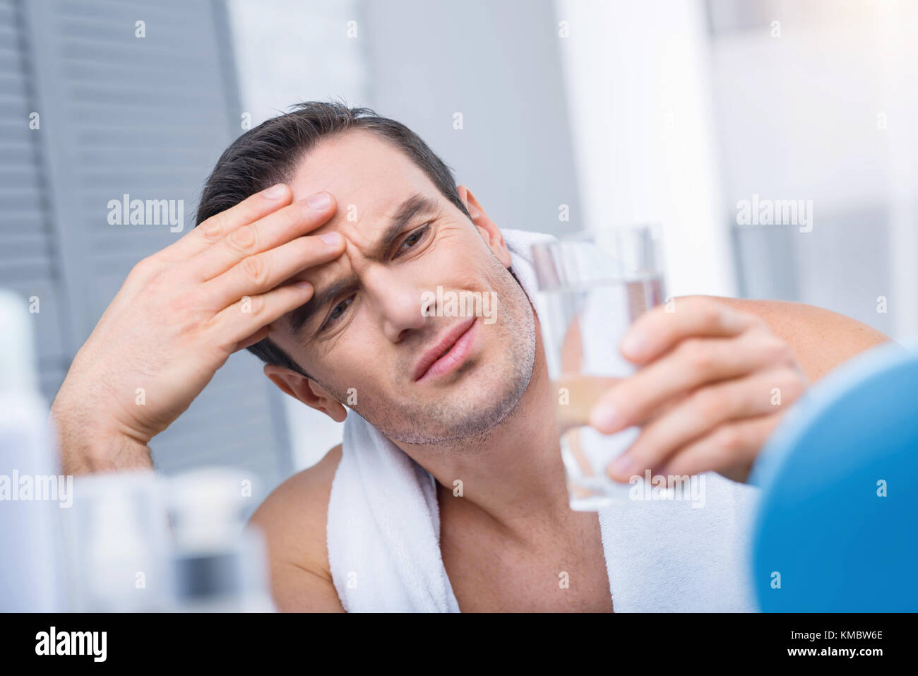 Angry hopeless man experiencing ache Stock Photo - Alamy