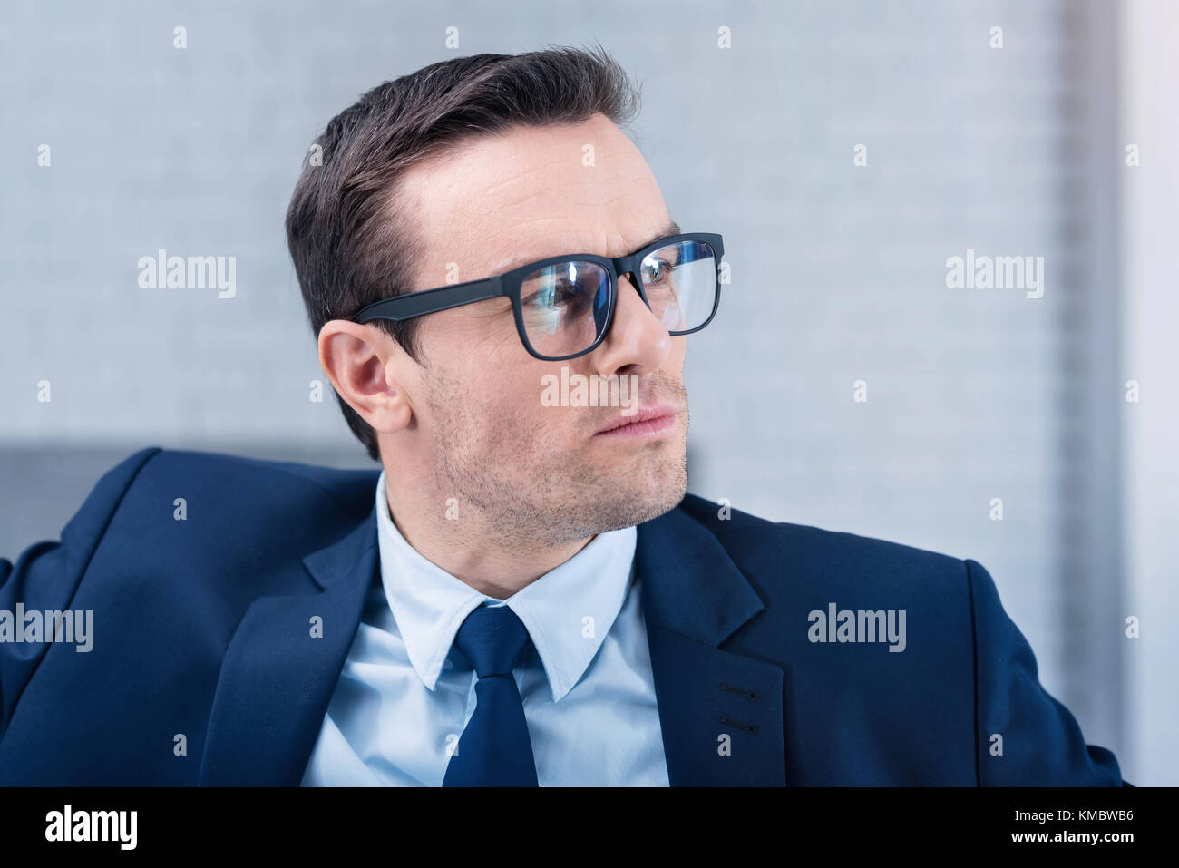 Pensive good looking man reflexing Stock Photo - Alamy