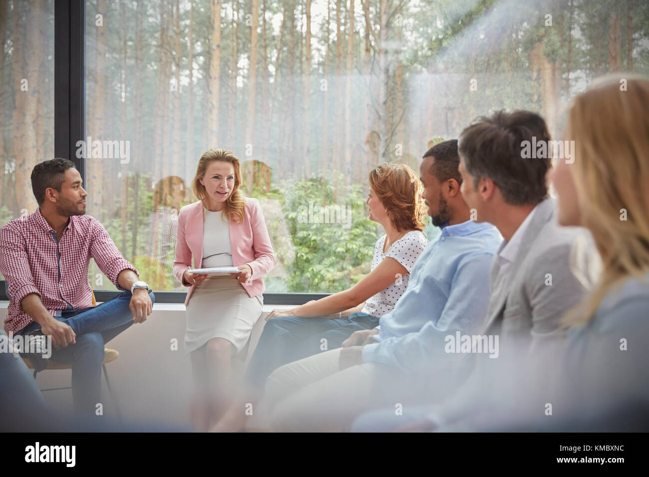 Man leading group therapy session hi-res stock photography and images ...