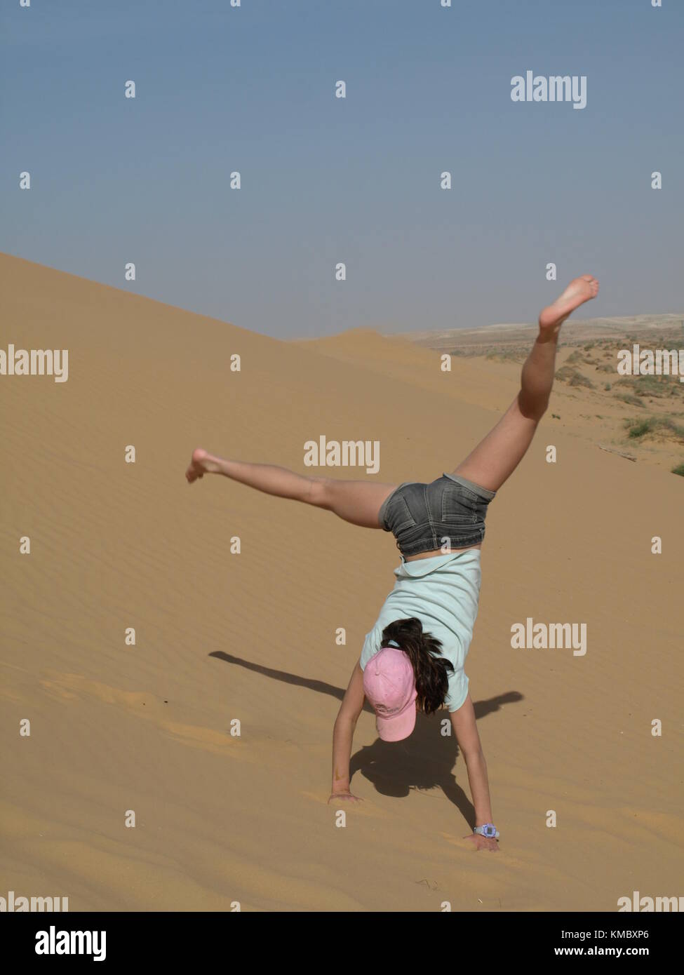 Girl on sand hi-res stock photography and images - Alamy