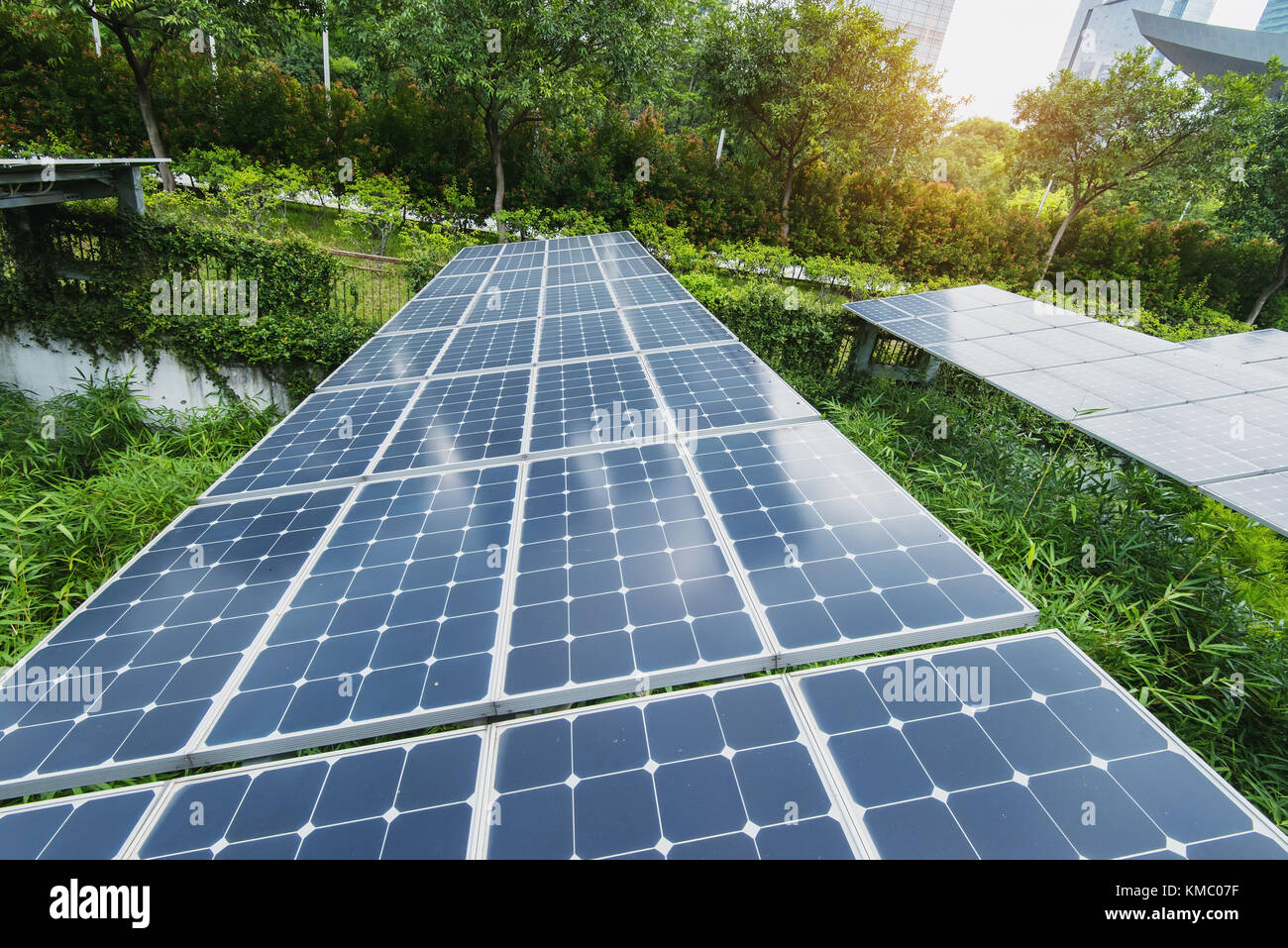 Solar Panels In The Park Of Modern City Stock Photo - Alamy