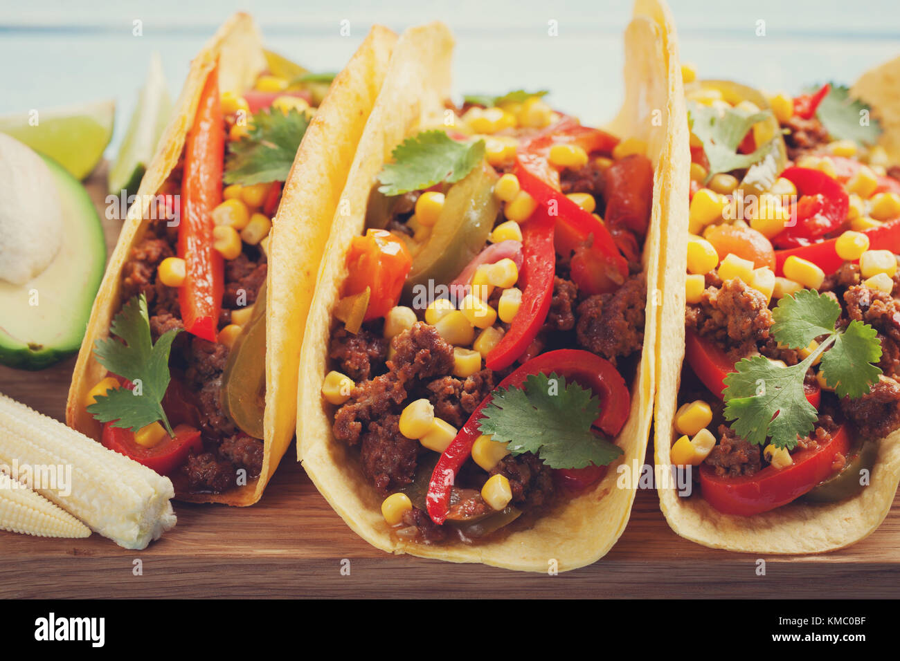 Mexican tacos with minced beef, vegetables and salsa. Tacos al pastor ...
