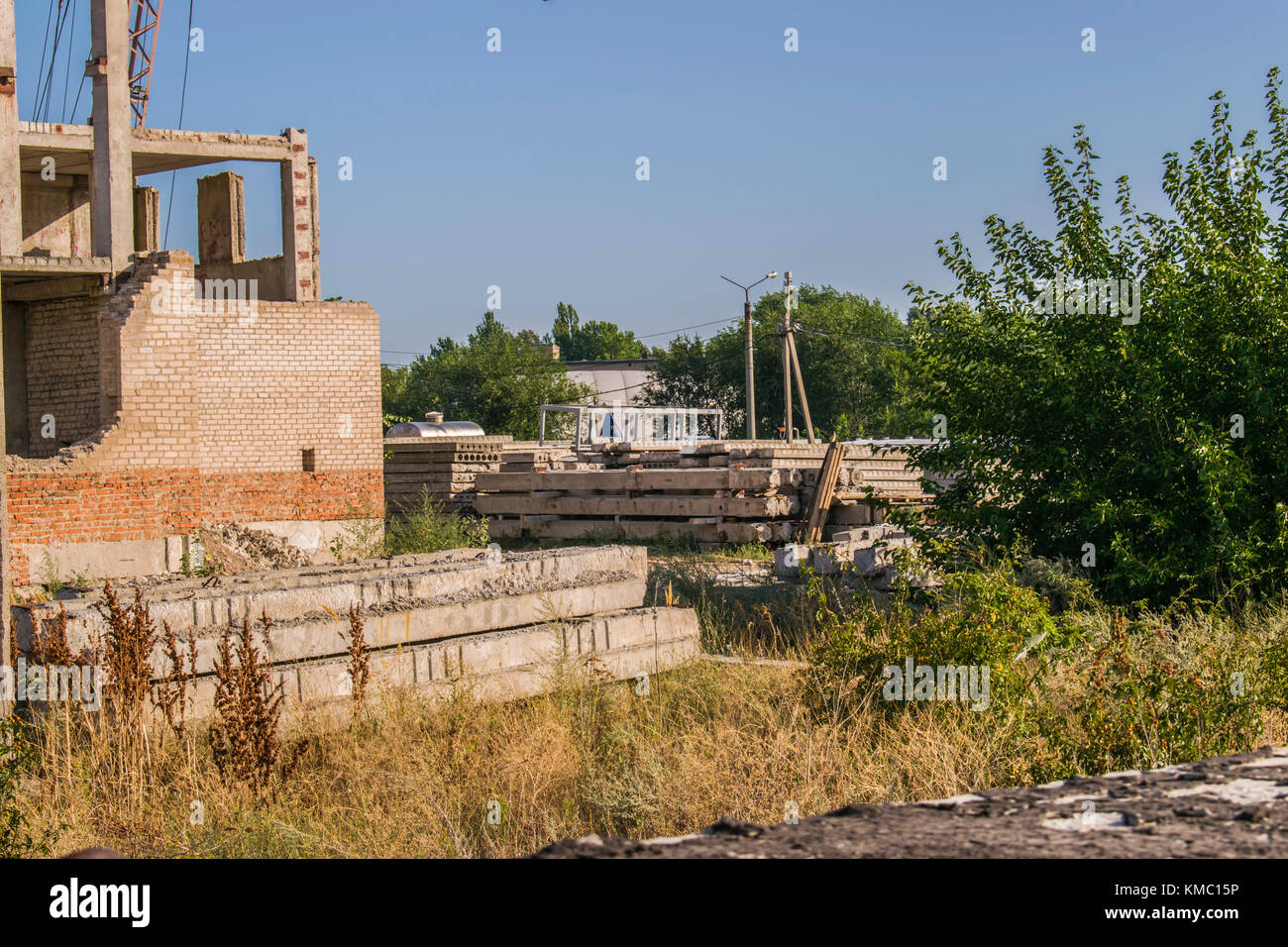 Construction site. Nice photo of unfinished building with blue sky in ...