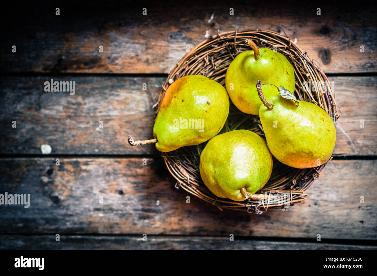 Pears On Rustic Wooden Background Stock Photo - Alamy