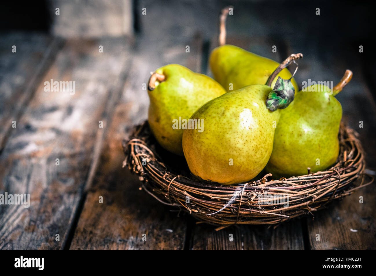 Pears On Rustic Wooden Background Stock Photo - Alamy