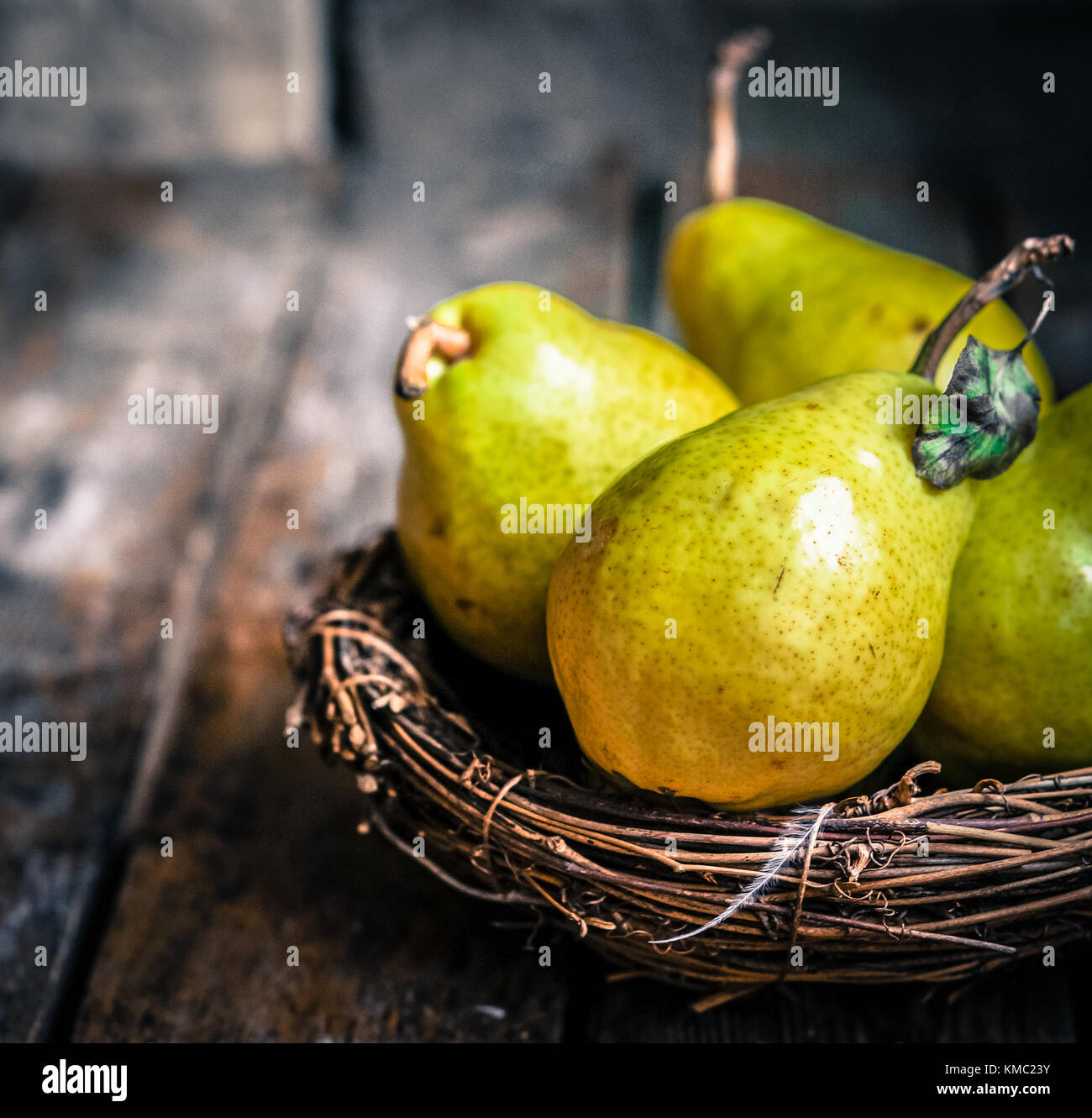 Pears On Rustic Wooden Background Stock Photo - Alamy