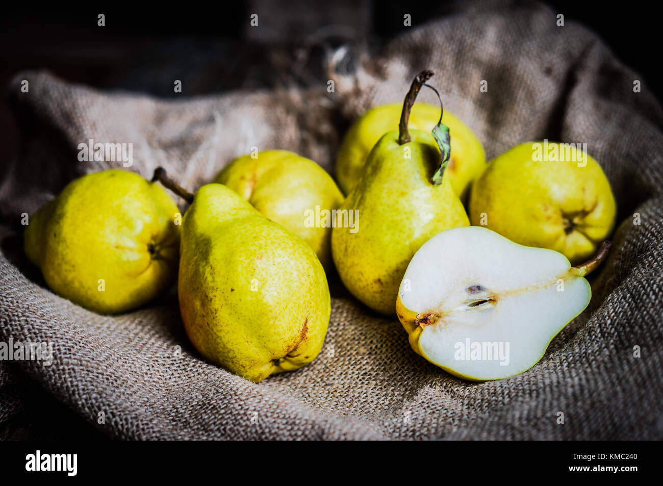 Pears On Rustic Wooden Background Stock Photo - Alamy