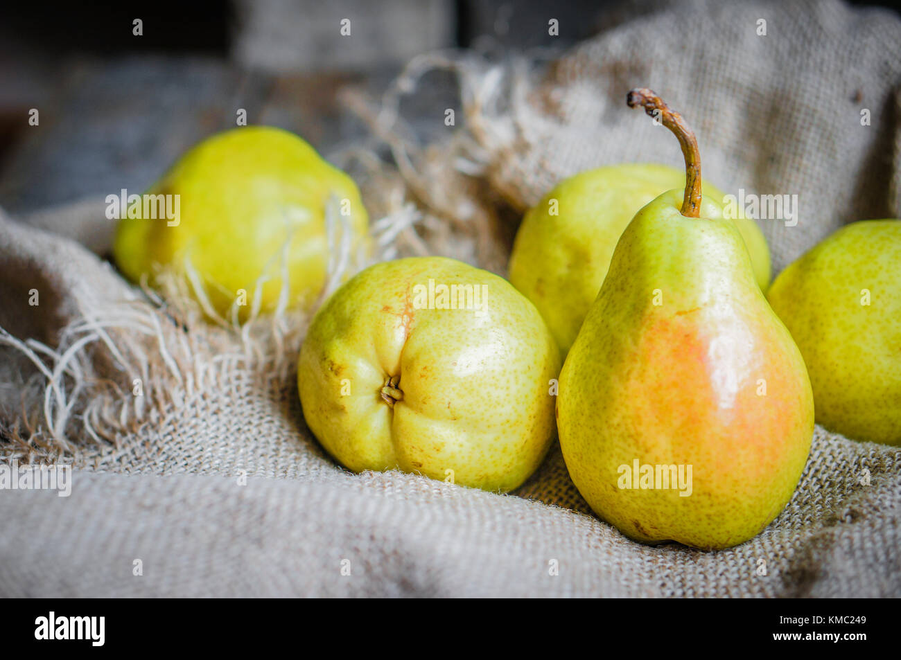 Pears On Rustic Wooden Background Stock Photo - Alamy