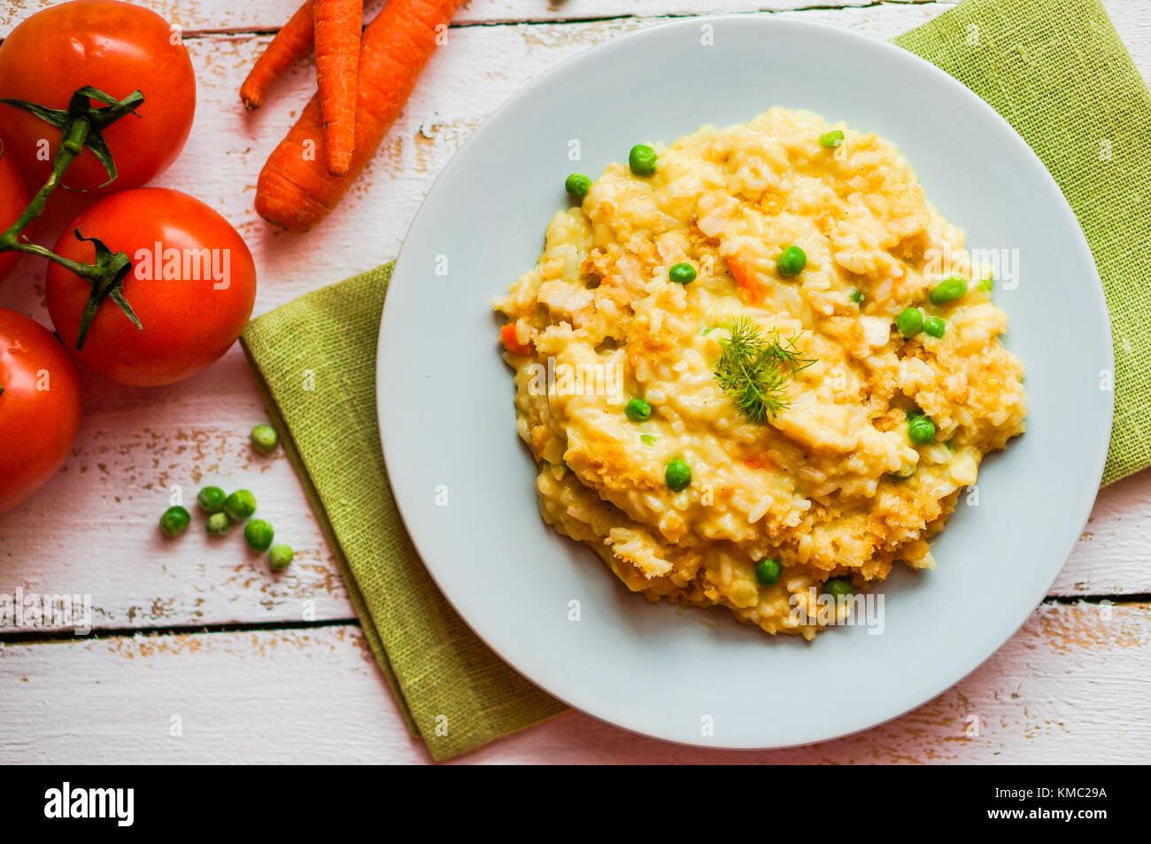 Rice With Vegetables And Chicken On White Wooden Background Stock Photo ...
