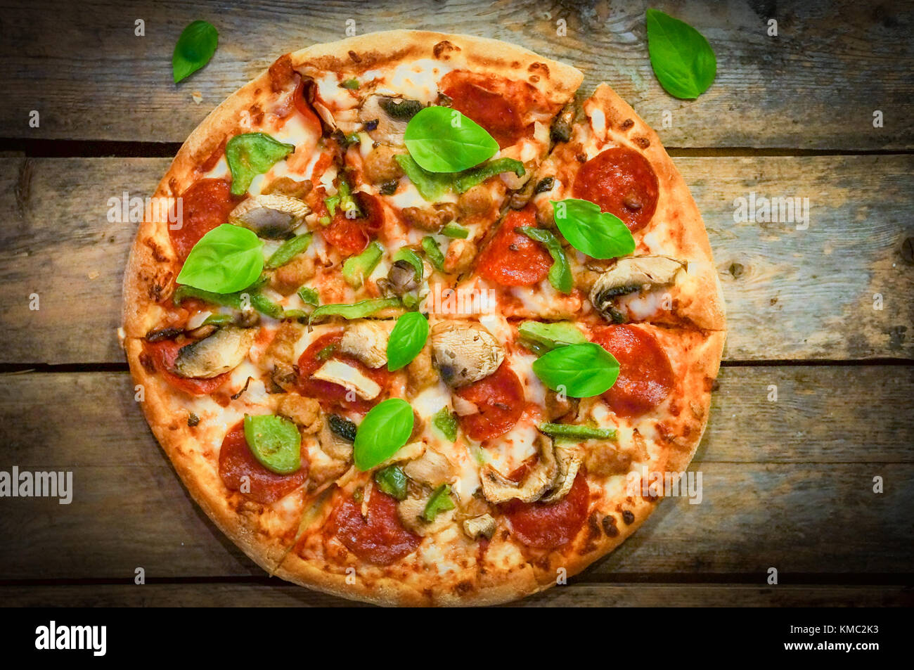 Sliced Home Made Pepperoni Pizza On Wooden Rustic Background Stock ...