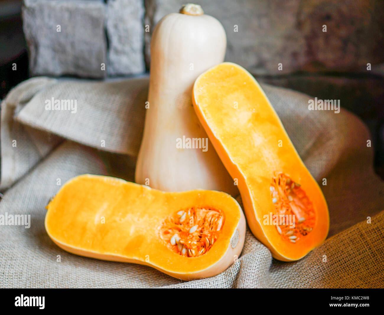 Uncooked Sliced Butternut Squash On Wooden Background Stock Photo - Alamy