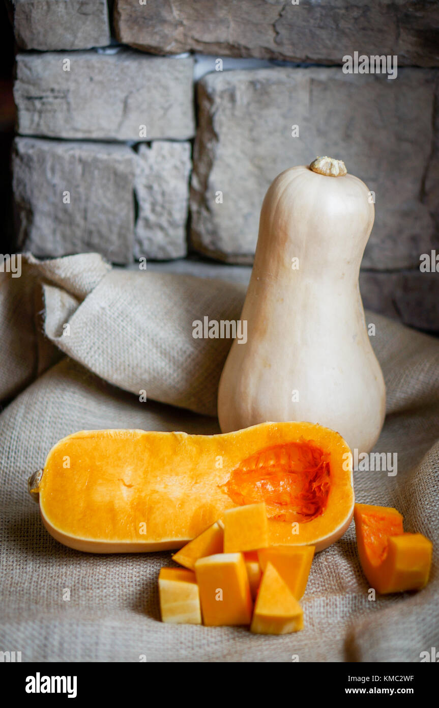 Uncooked Sliced Butternut Squash On Wooden Background Stock Photo - Alamy