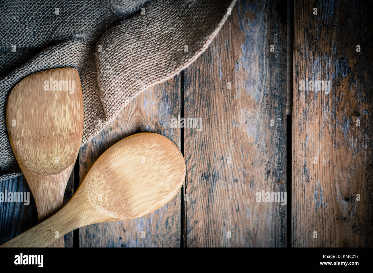 Wooden Kitchen Utensils And Board On Wood Background Stock Photo - Alamy