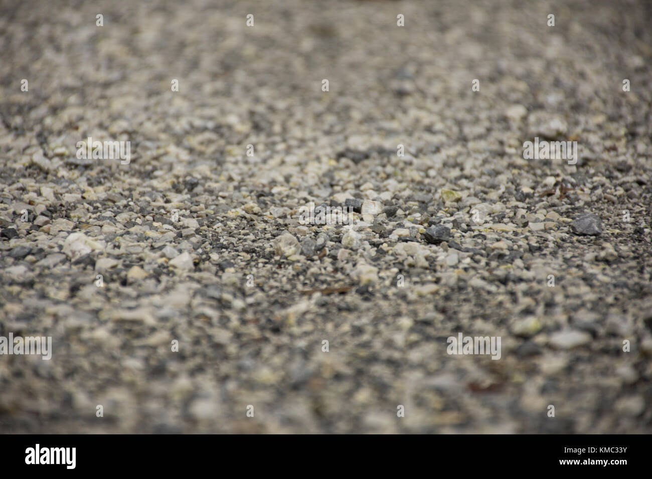 a macro shot of asphalt sidewalk for a pretty gray industrial ...