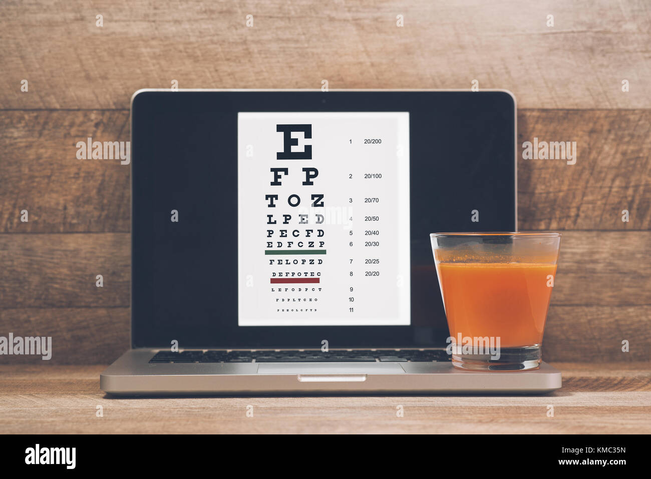 Healthy eyes. Eye chart and medicine Stock Photo - Alamy
