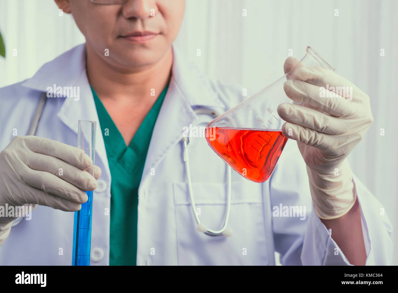 Scientist chemist holds test tube hi-res stock photography and images ...