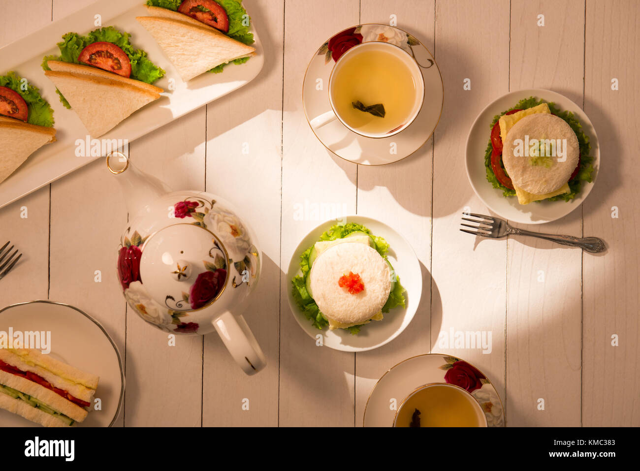 Afternoon tea table. tea set with sandwiches Stock Photo - Alamy