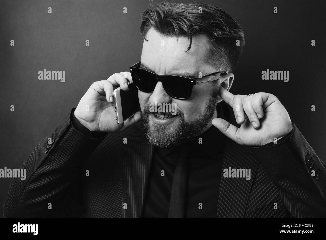 Man beard glasses working on Black and White Stock Photos & Images - Alamy