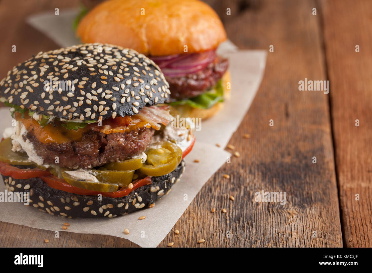 Set of three mini homemade Burger with marble beef and vegetables on a ...