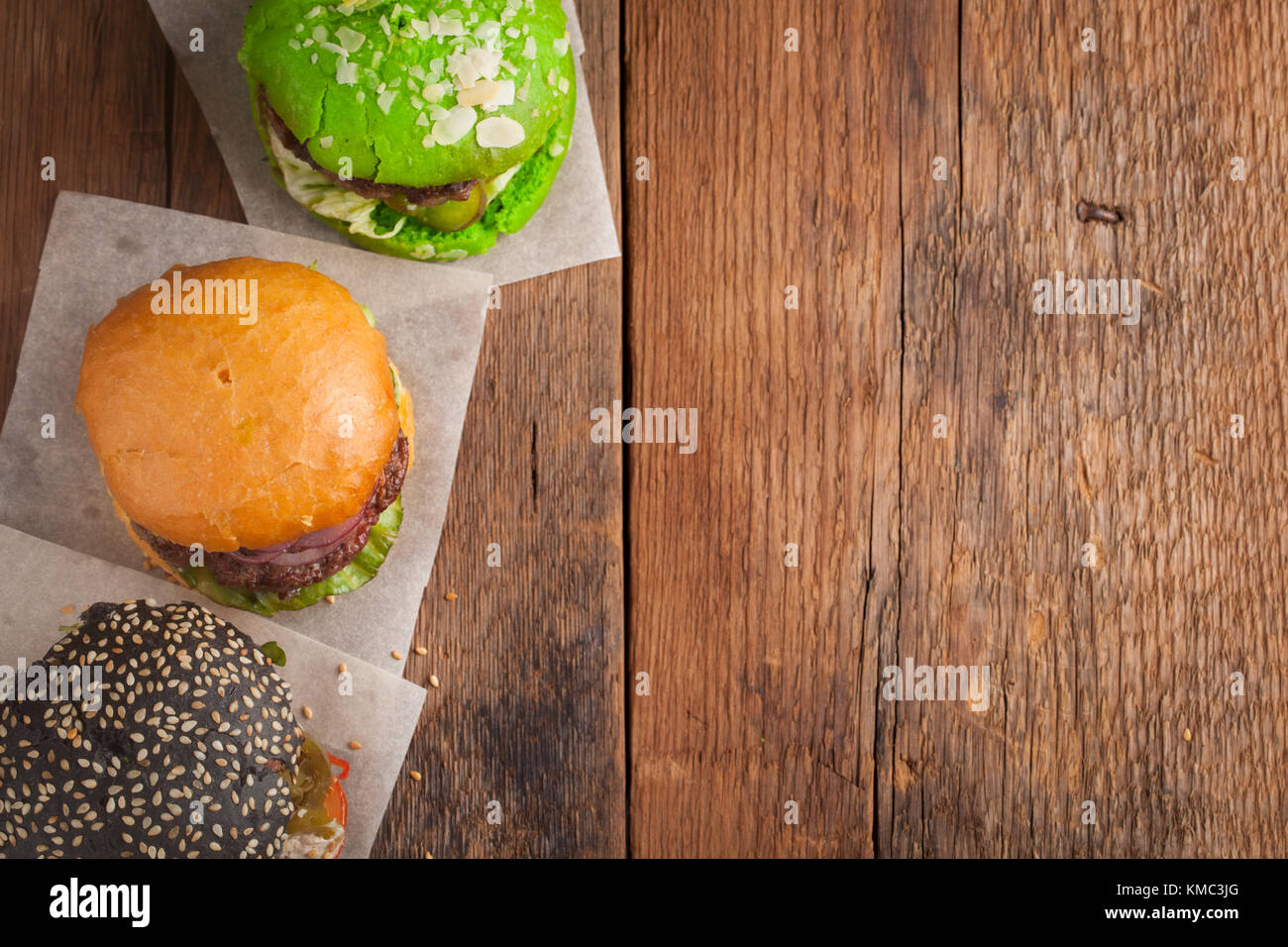 Set of three mini homemade Burger with marble beef and vegetables on a ...