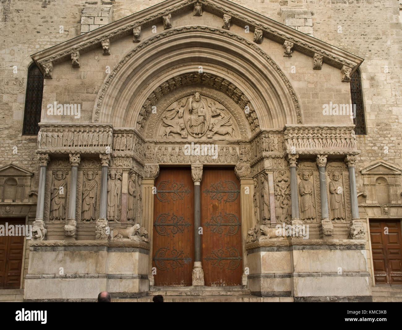 West facade of the Saint Trophime Cathedral in Arles, France. Bouches ...