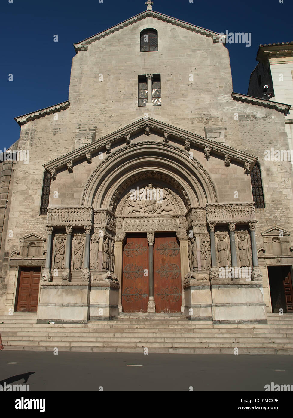 West facade of the Saint Trophime Cathedral in Arles, France. Bouches ...