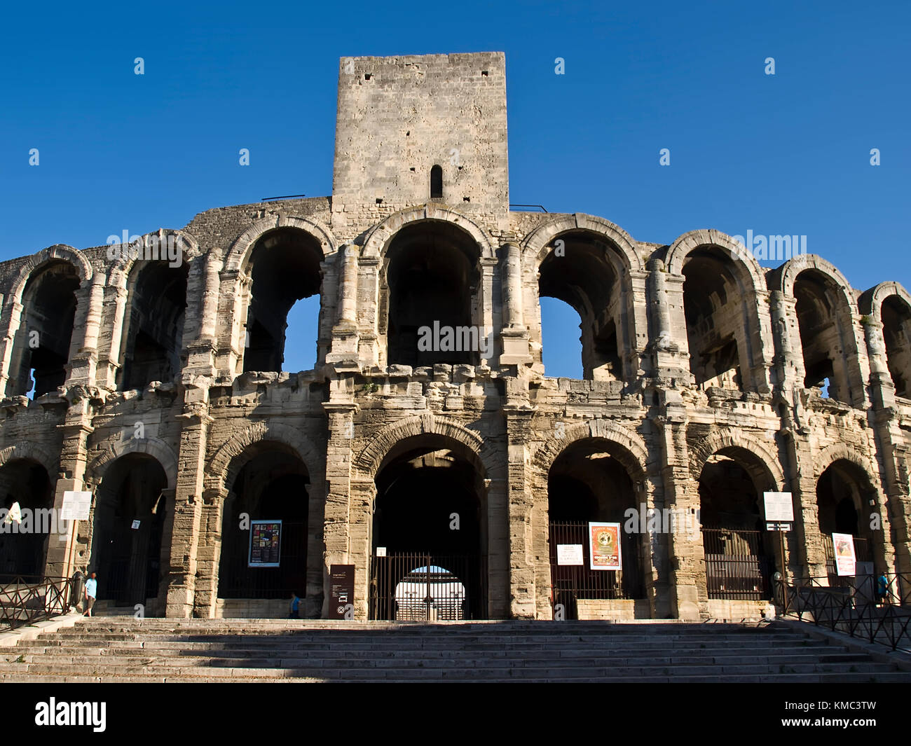 O The Roman Amphitheater in the old town of Arles in Provence in the ...