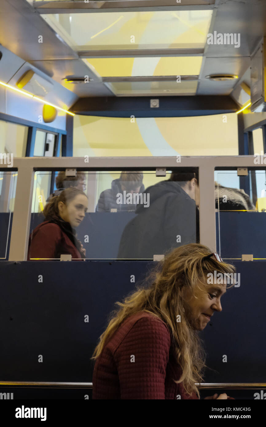 A funicular train transports visitors to and from the peak of Mount ...