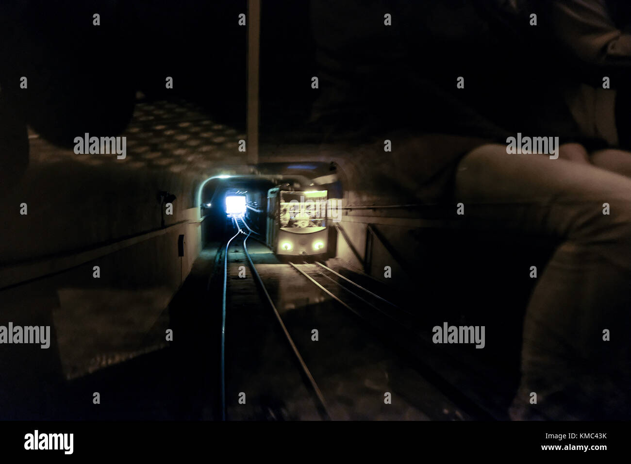 A funicular train transports visitors to and from the peak of Mount ...