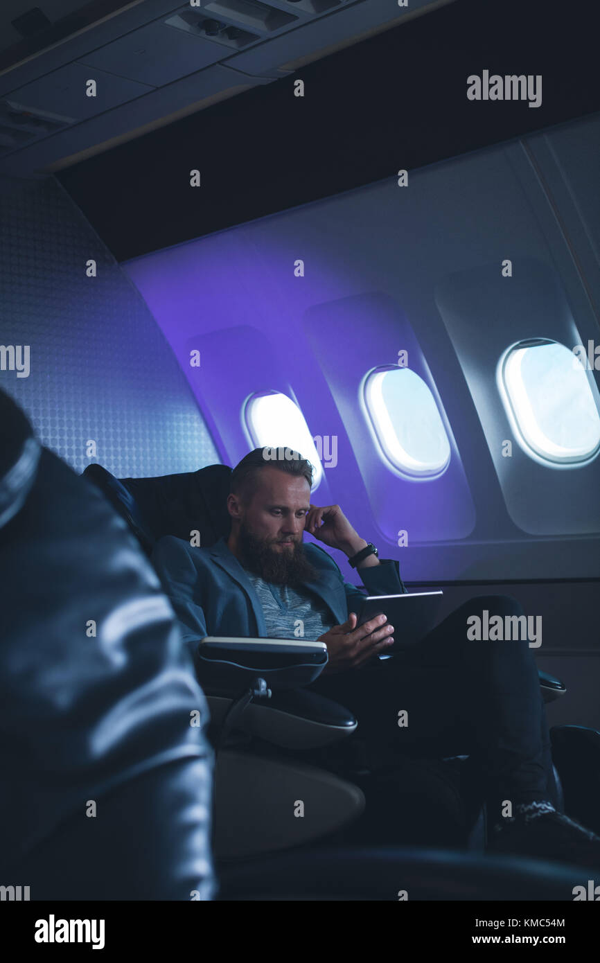 Airplane tablet seat hi-res stock photography and images - Alamy