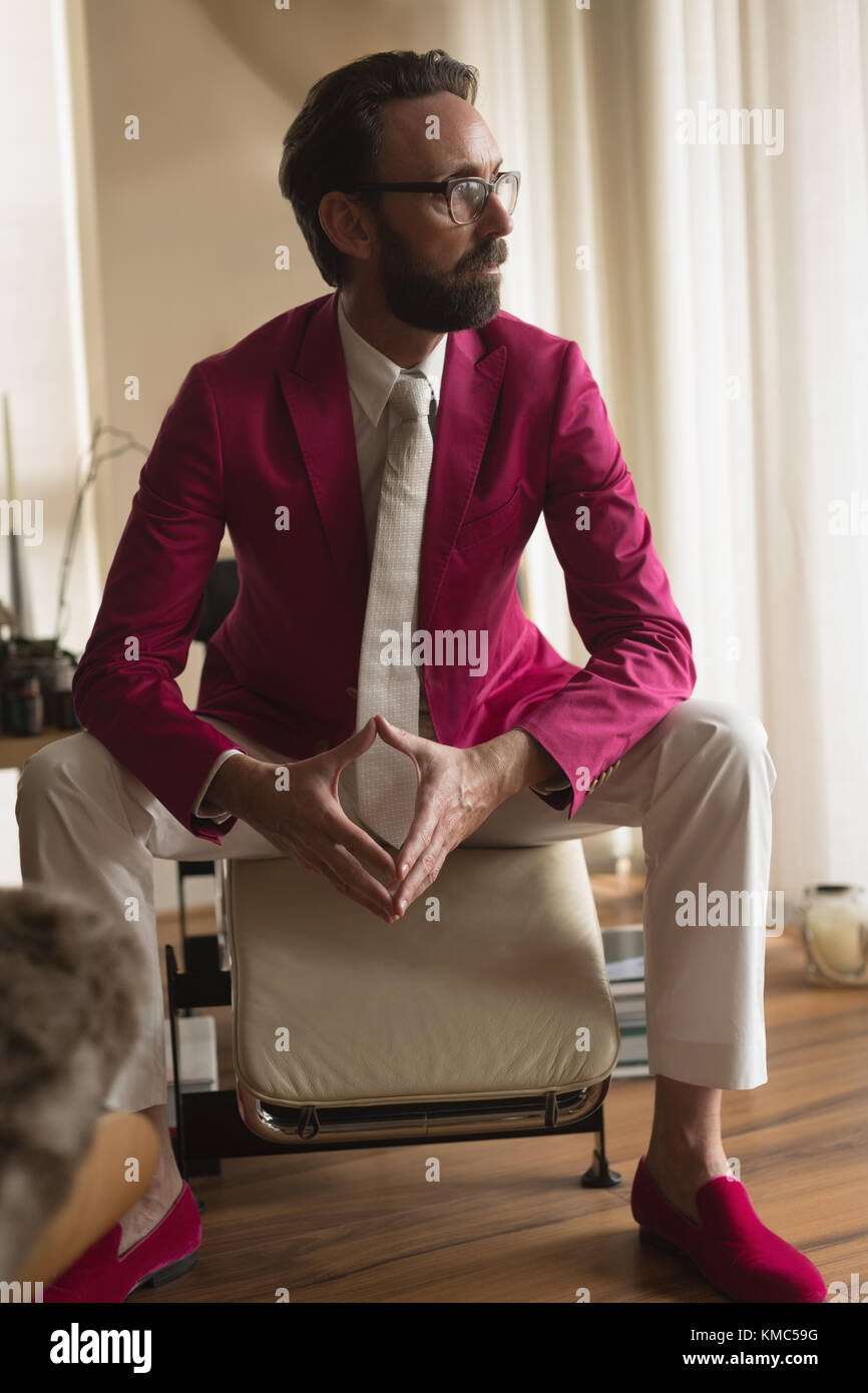 Male model sitting chair hi-res stock photography and images - Alamy