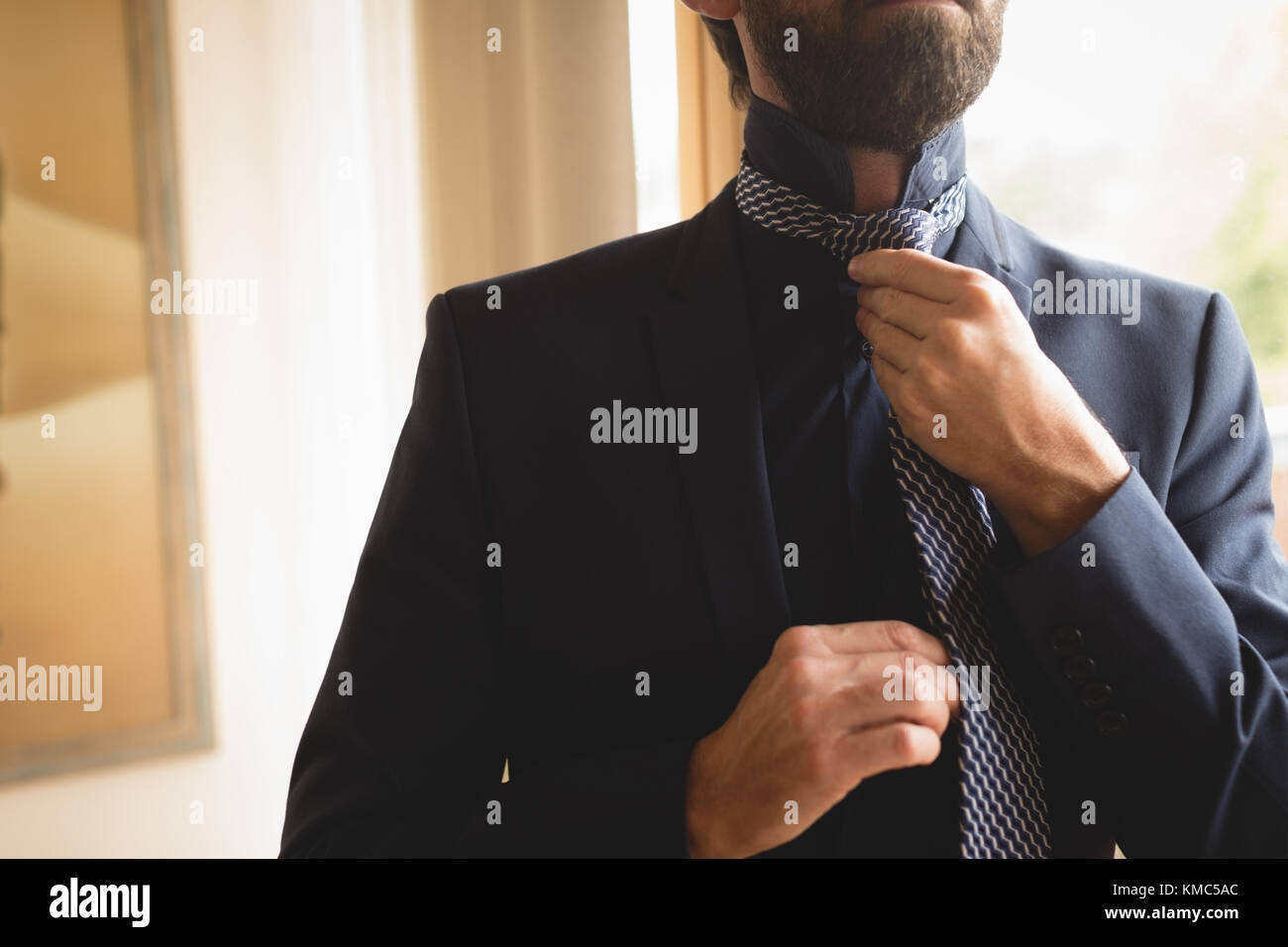 Man wearing tie hi-res stock photography and images - Alamy