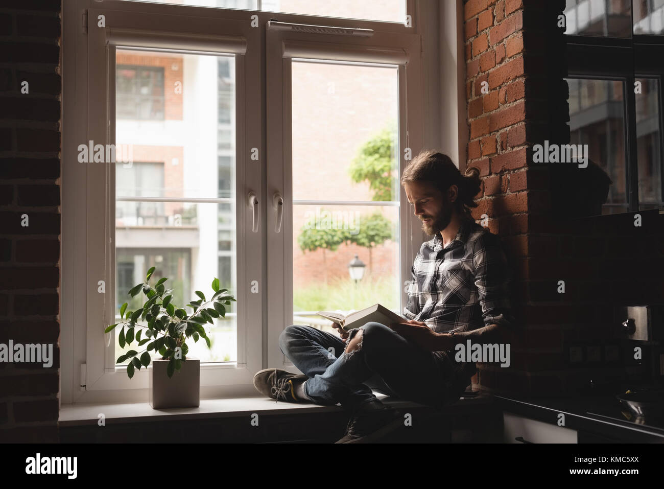 Professional man with book hi-res stock photography and images - Alamy