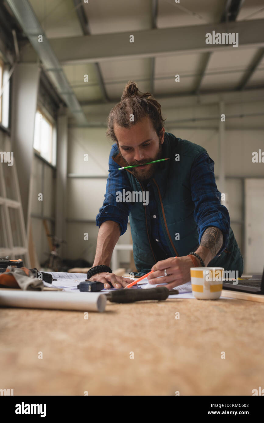 Carpenter drawing on paper Stock Photo - Alamy