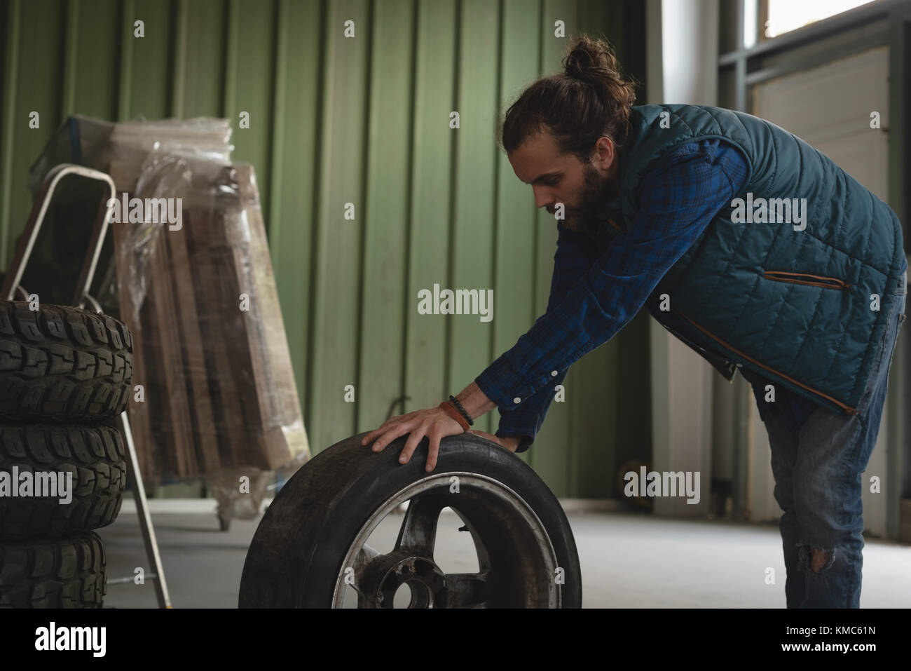 Man working in warehouse Stock Photo - Alamy