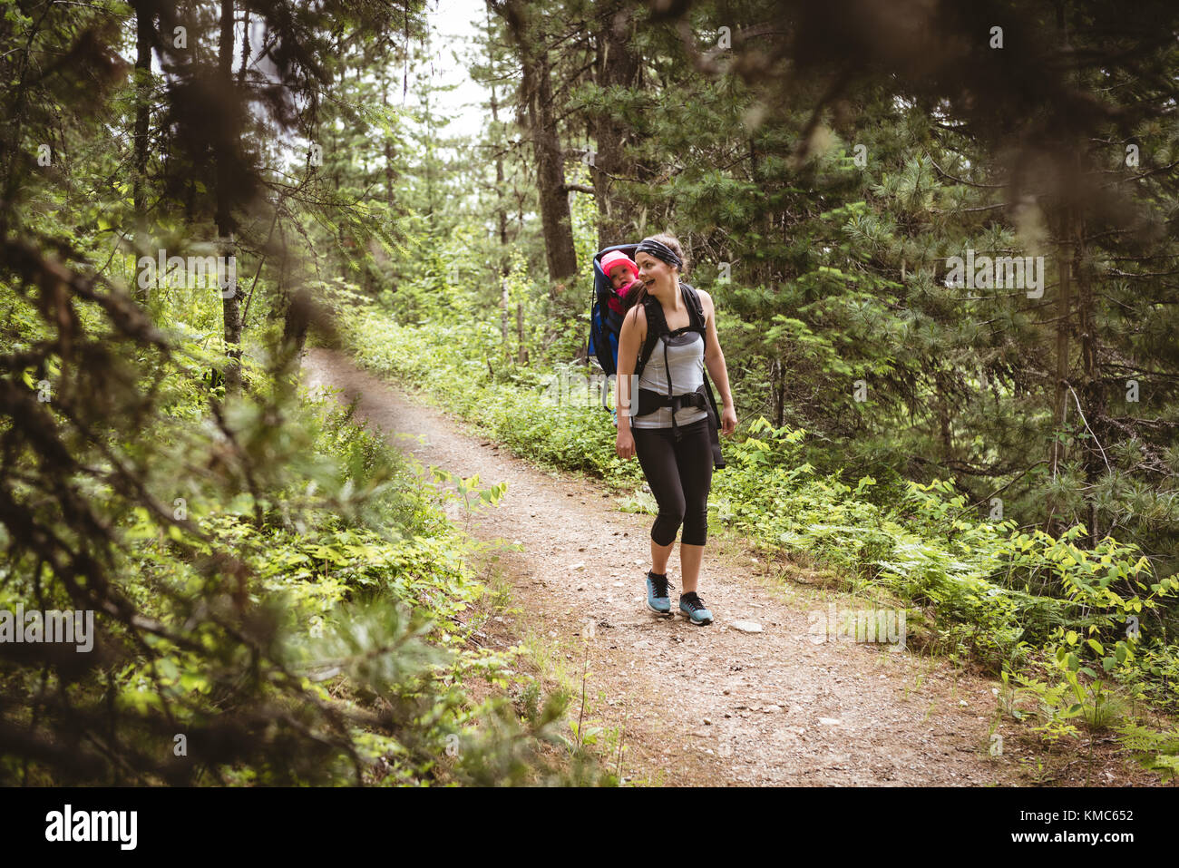 Mother carrying her baby in backpack carrier Stock Photo - Alamy Mother carrying her baby in backpack carrier Stock Photo - Alamy
