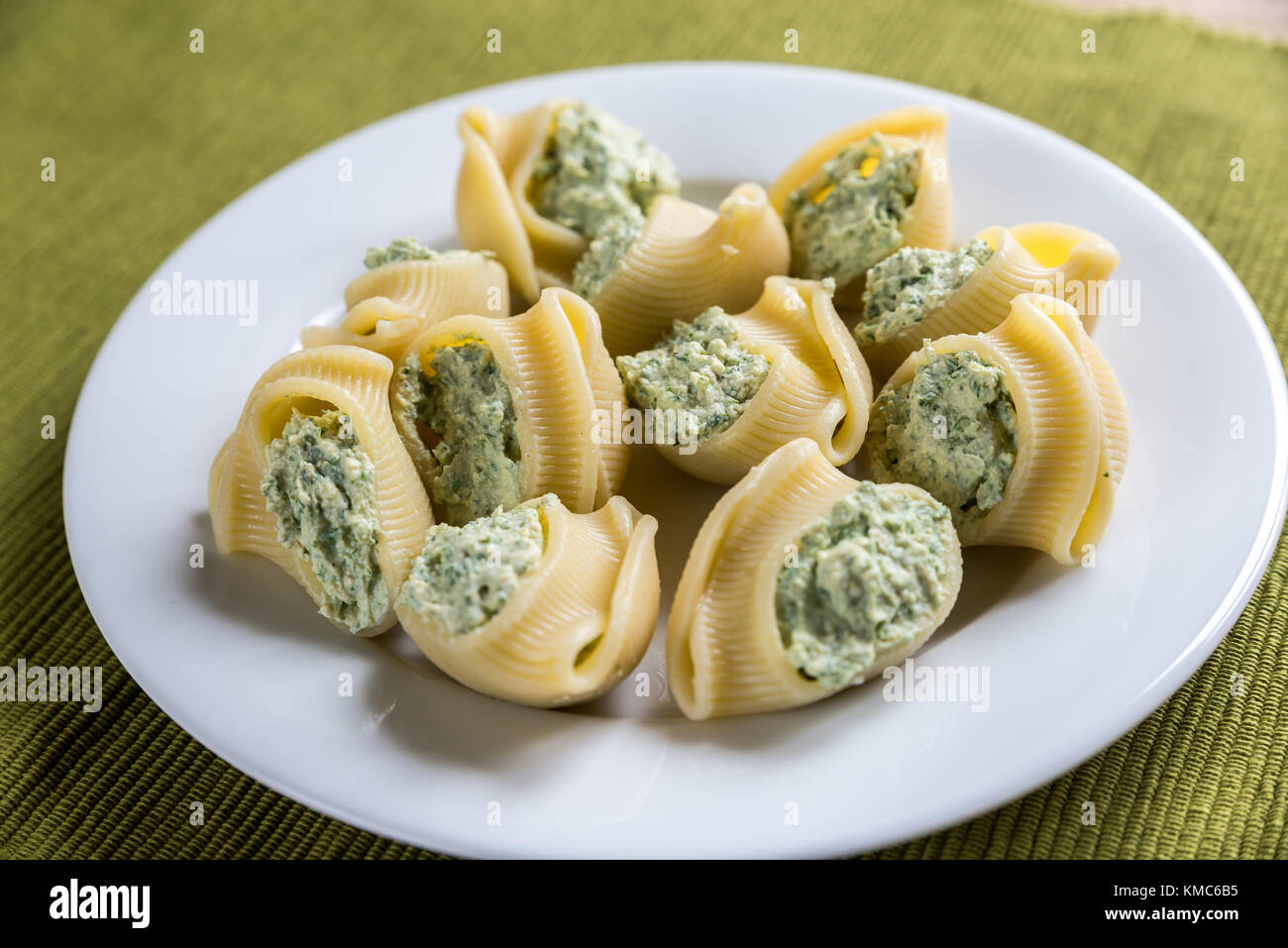 Stuffed lumaconi with cheese Stock Photo - Alamy