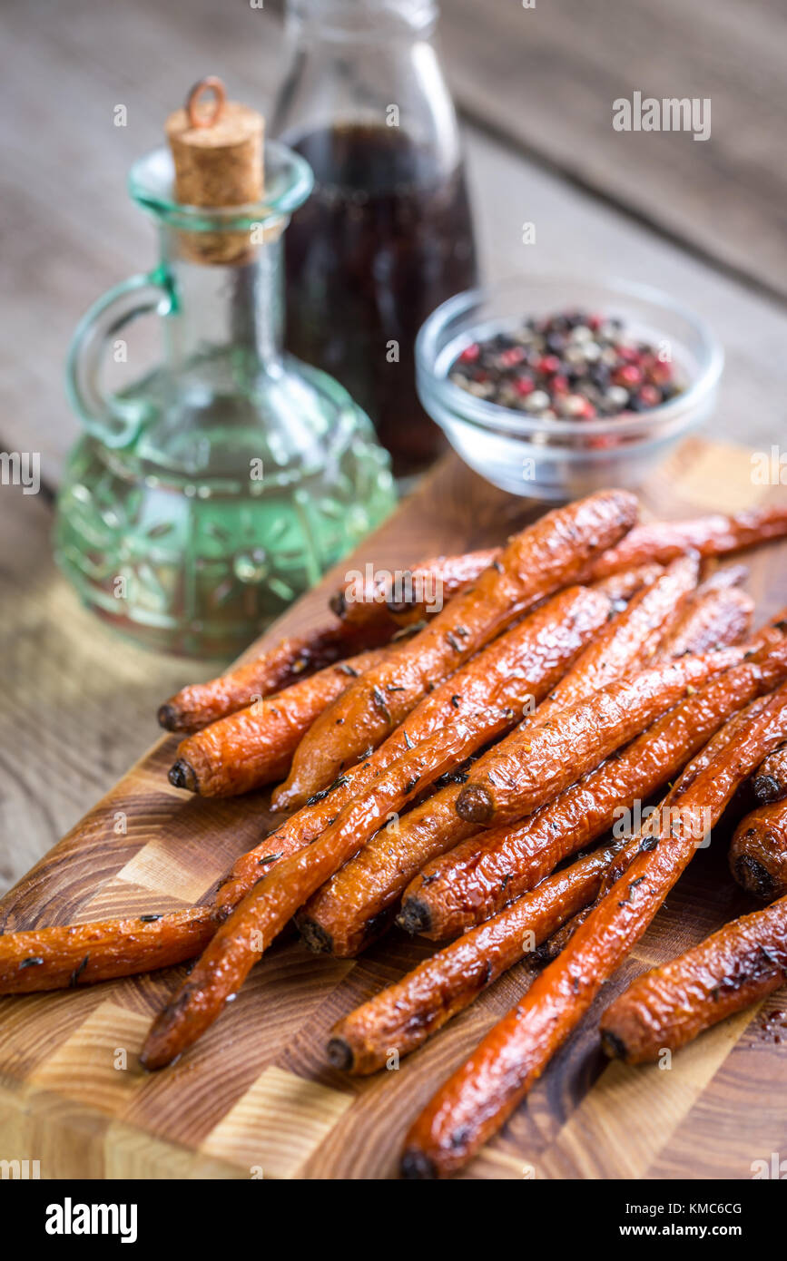 Glazed carrots on the baking tray Stock Photo - Alamy