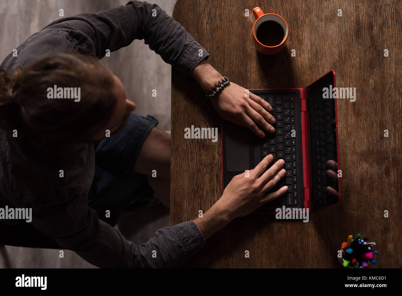 Male executive using laptop Stock Photo - Alamy