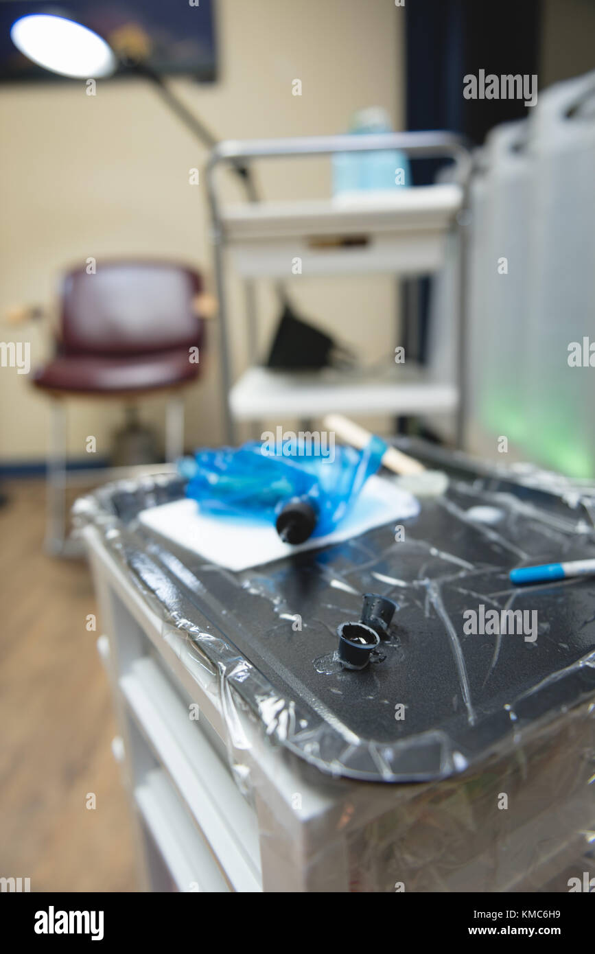 Tattoo machine on table Stock Photo - Alamy