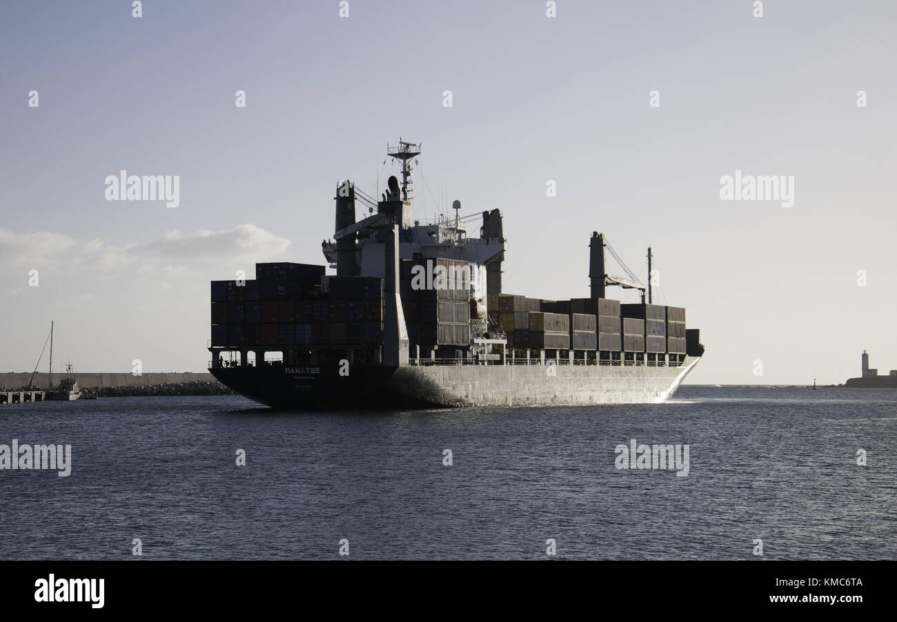 container ship entering Praia harbour on Santiago island, main port of ...