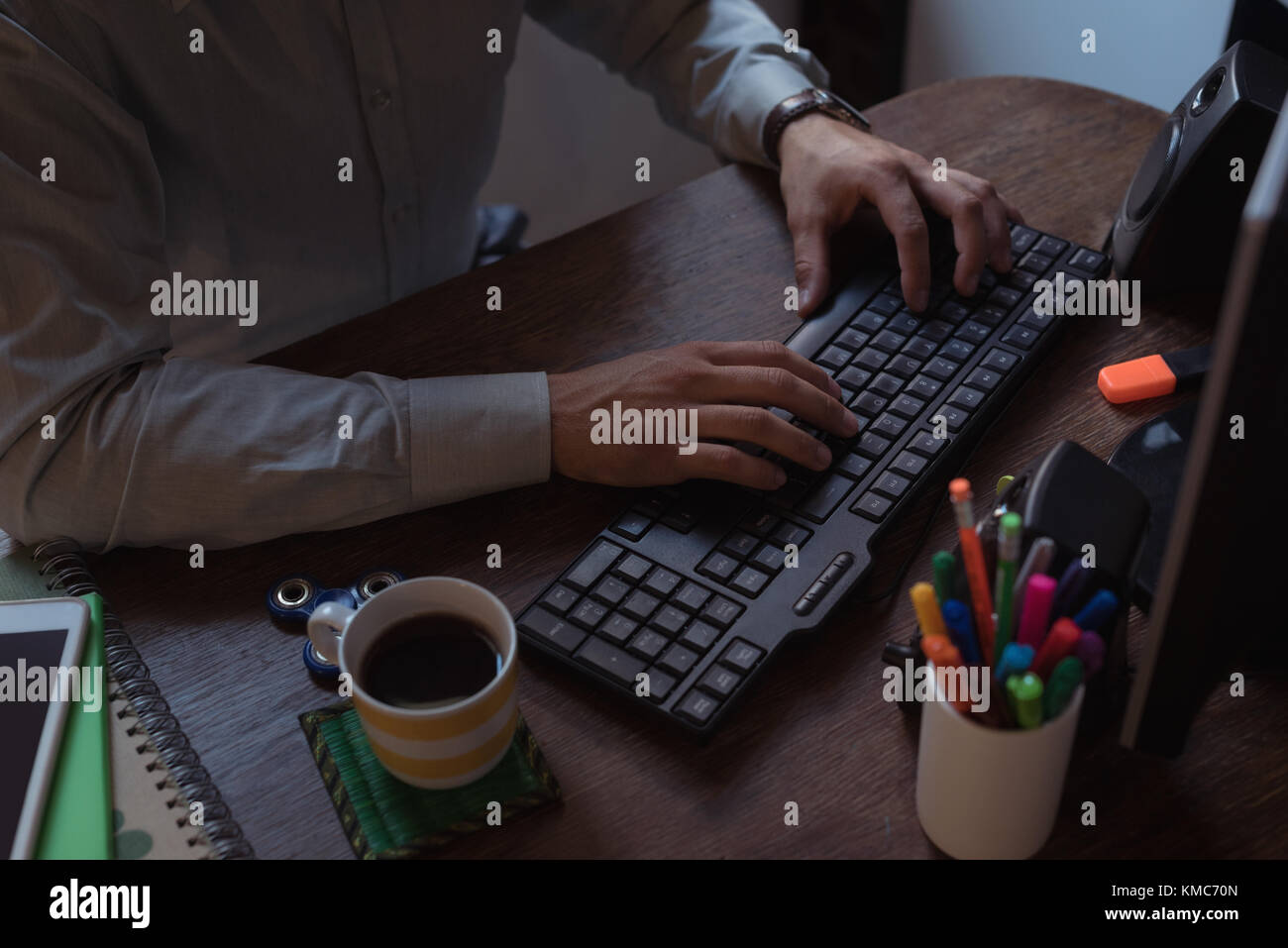 Executive working on computer in office Stock Photo - Alamy