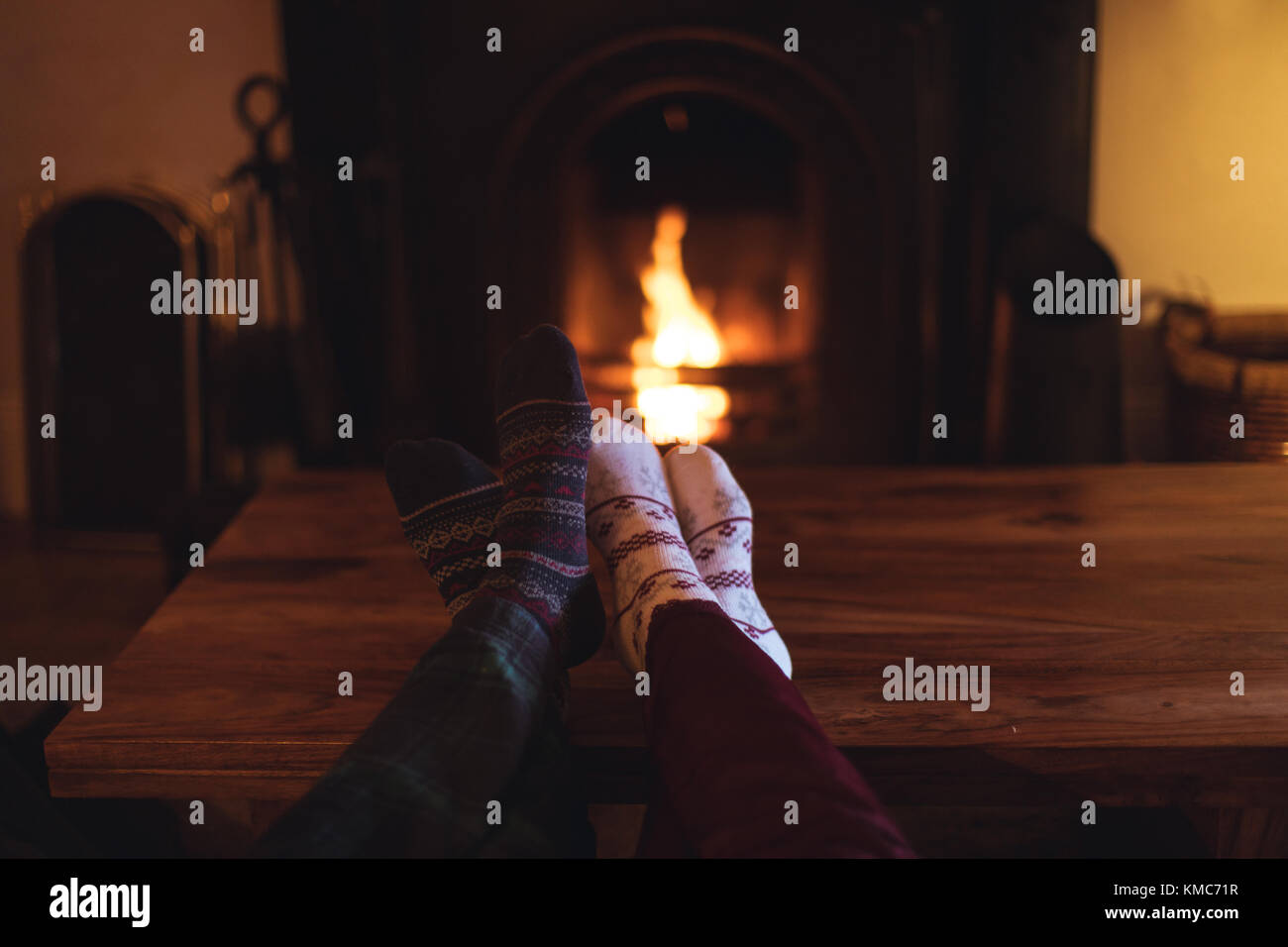 Female feet fireplace hi-res stock photography and images - Alamy