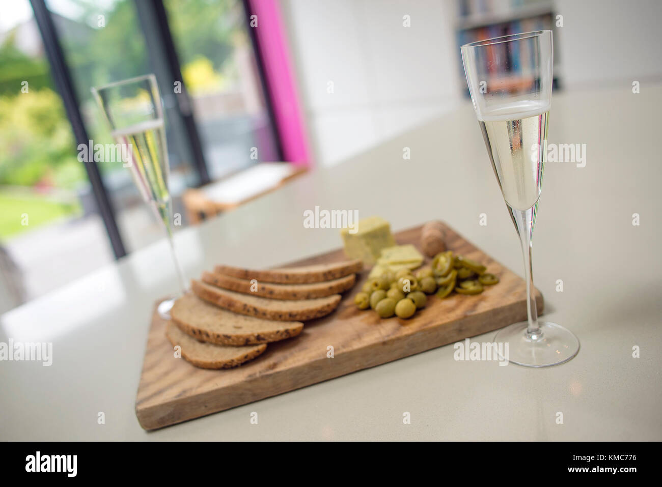 Champagne Flutes and Food on Kitchen Counter Stock Photo - Alamy