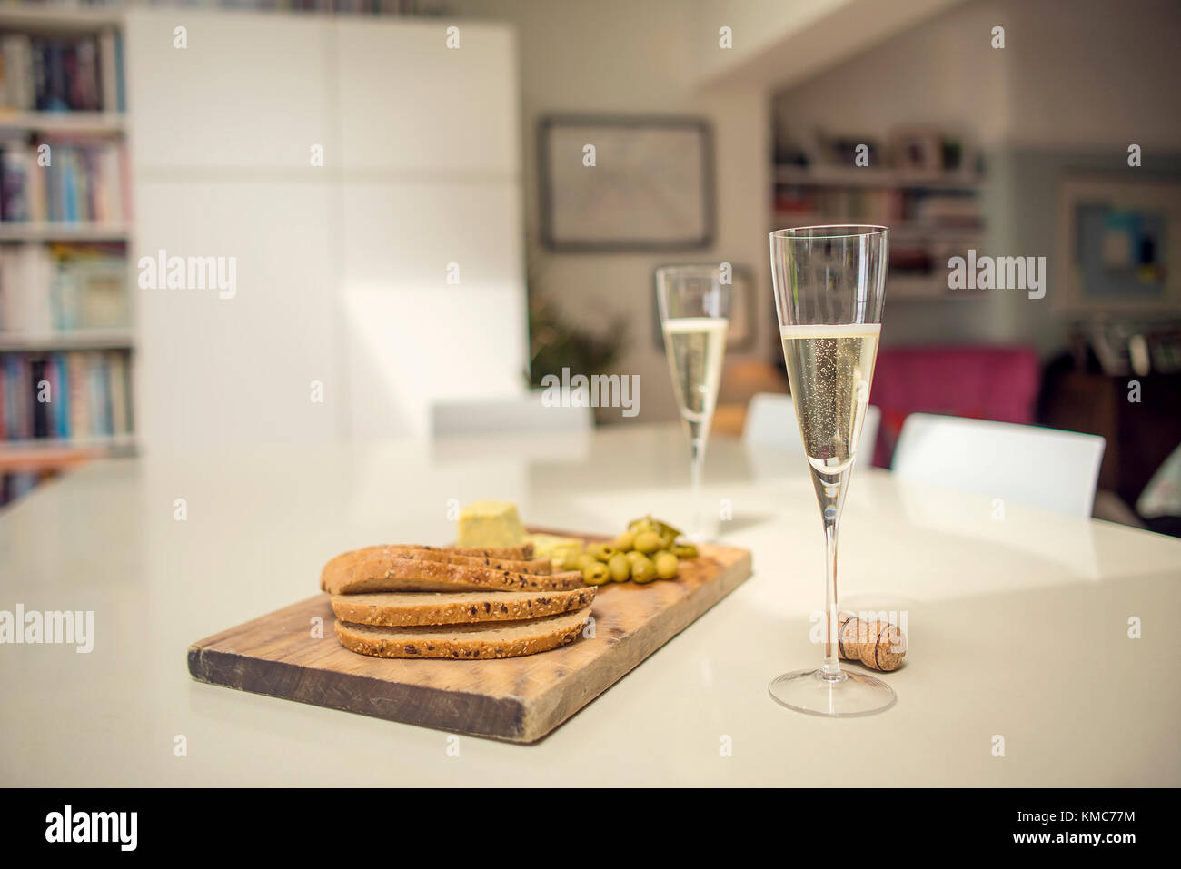 Champagne Flutes and Food on Kitchen Counter Stock Photo - Alamy