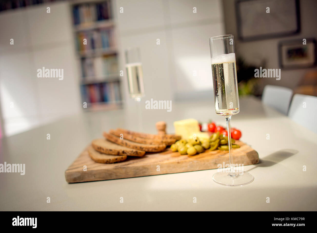 Champagne Flutes and Food on Kitchen Counter Stock Photo - Alamy