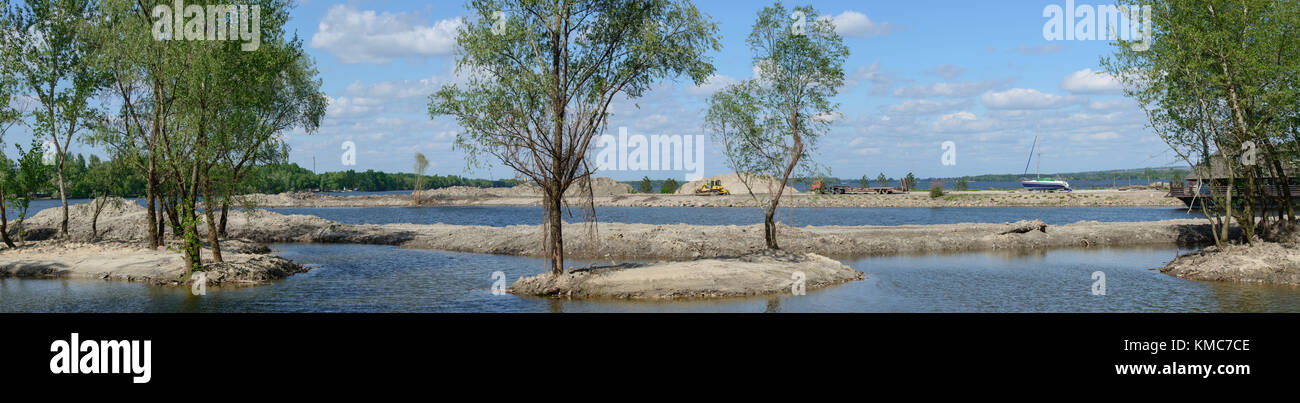 Scenic panorama of Dnieper riverbank landscape in spring sunlight in ...