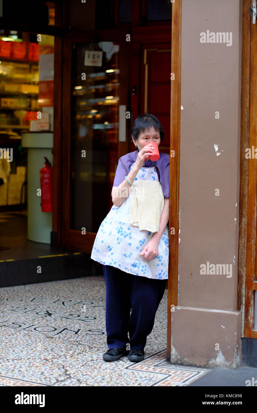 Old lady wearing apron hi-res stock photography and images - Alamy